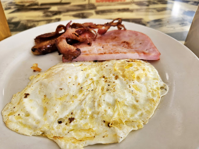 Sometimes the classics need no improvement. Perfectly cooked eggs with ham and bacon &ndash; the breakfast equivalent of a greatest hits album.