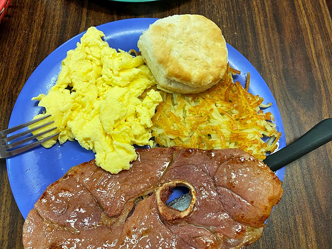 Country ham steak, eggs, and hash browns – the breakfast equivalent of a power trio that's been playing together for decades.