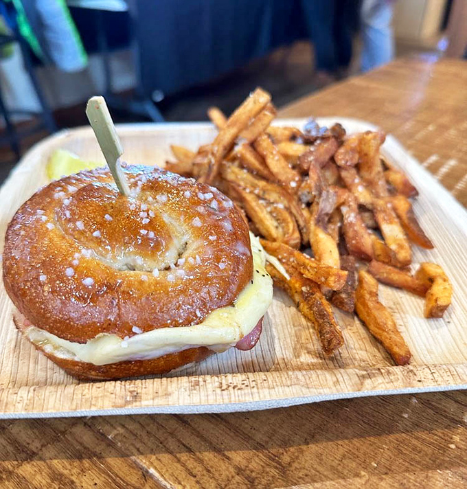 The pretzel sandwich &ndash; Pennsylvania's answer to the age-old question: "How do we make melted cheese even better?" Served with golden fries.