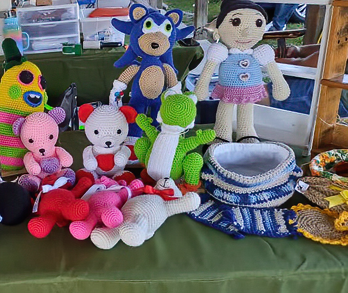 Handcrafted crochet characters stand at attention, their yarn personalities more vibrant than most Hollywood celebrities I've interviewed.