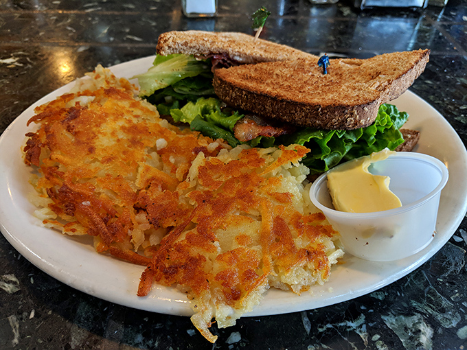 These hash browns achieve that mythical balance&mdash;shatteringly crisp exterior giving way to tender potato within. The breakfast equivalent of a perfect vinyl record.
