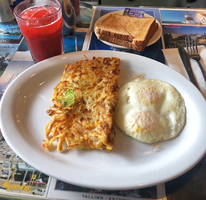 The hash brown melt—where potato meets purpose. Crispy shredded potatoes cradle eggs and fillings like a carb-loaded hug for your taste buds.