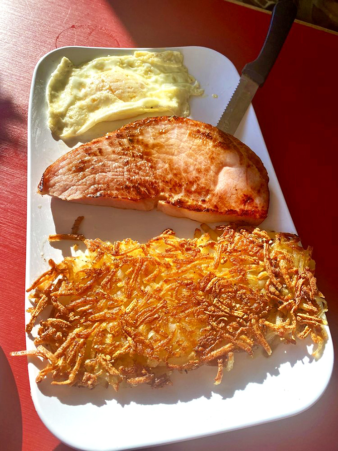 These hash browns deserve their own Instagram account &ndash; crispy, golden lattice work that makes French fries look like underachievers.