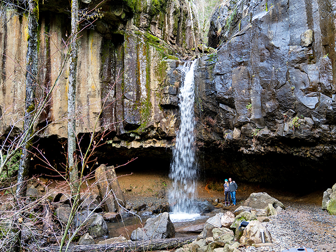 Hedge Creek Falls cascades dramatically through volcanic rock, creating nature's version of that expensive water feature your neighbor installed last summer.