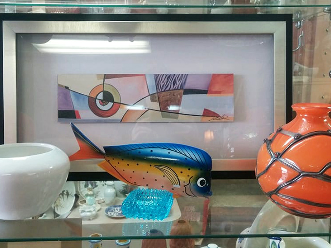 Colorful conversation pieces that transform ordinary shelves into art galleries. That blue fish looks like he swam straight out of a Wes Anderson film.