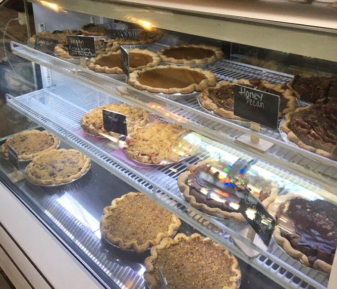 The display case of dreams. Each pie waits patiently behind glass like contestants in a beauty pageant where everyone's a winner&mdash;especially your taste buds.