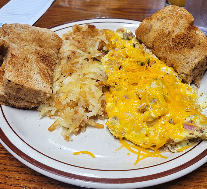 Western omelet meets hash browns in a breakfast romance that would make Nicholas Sparks weep. The melted cheese pulls like strings on my heart.