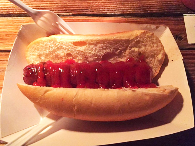 Even the hot dog gets the royal treatment here &ndash; nestled in a proper bun and adorned with enough toppings to make it feel like the burger's worthy sidekick.