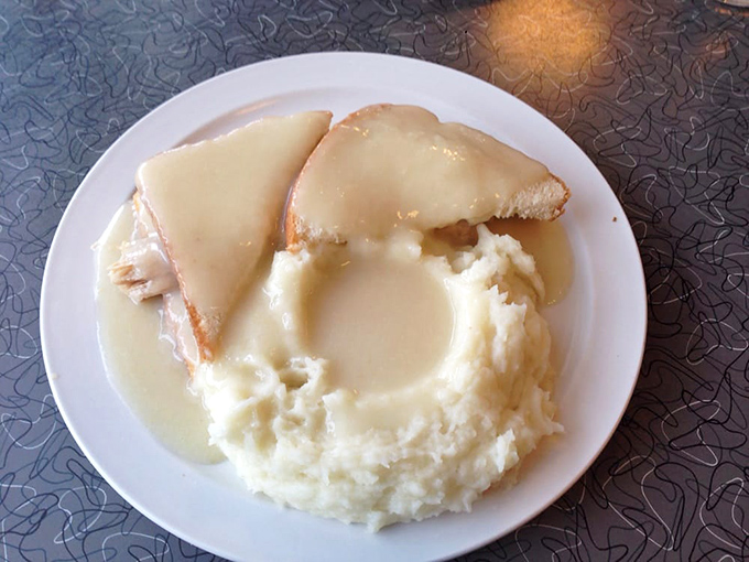 Comfort on a plate&mdash;tender turkey and cloud-like mashed potatoes swimming in gravy that could make a vegetarian reconsider their life choices.