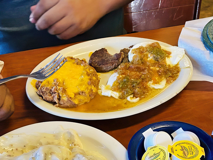 This breakfast plate doesn't care about your diet plans. It arrived to comfort, satisfy, and possibly require a nap afterward.