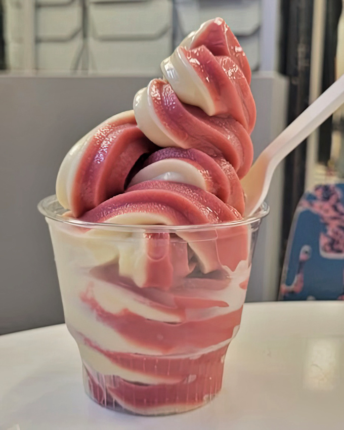 Soft serve that swirls like a modern art masterpiece. The pink and white dance together in a cup that's worth crossing state lines for.