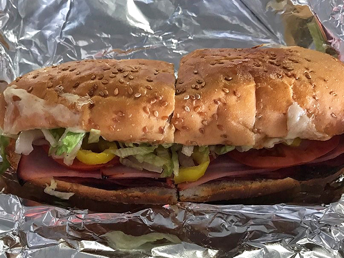 This Italian sub isn't just a sandwich; it's a carefully constructed tower of flavors that demands to be approached with both hands and respect.