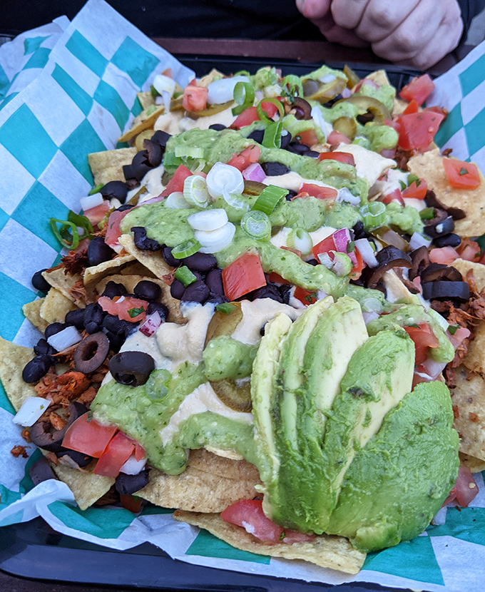 Nachos that could convert a carnivore! Avocado, black beans, and cashew cheese create a fiesta of textures that'll have you wondering why you ever needed the other stuff.