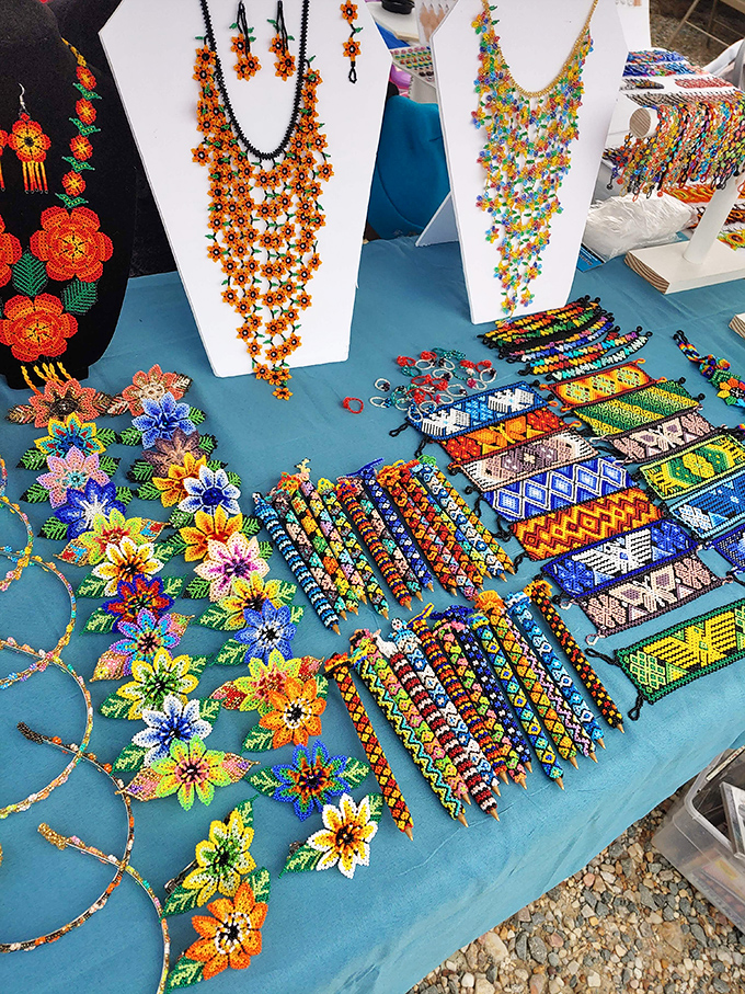 Beaded masterpieces that would make Frida Kahlo swoon&mdash;intricate handcrafted jewelry transforms a simple blue tablecloth into an artist's canvas.