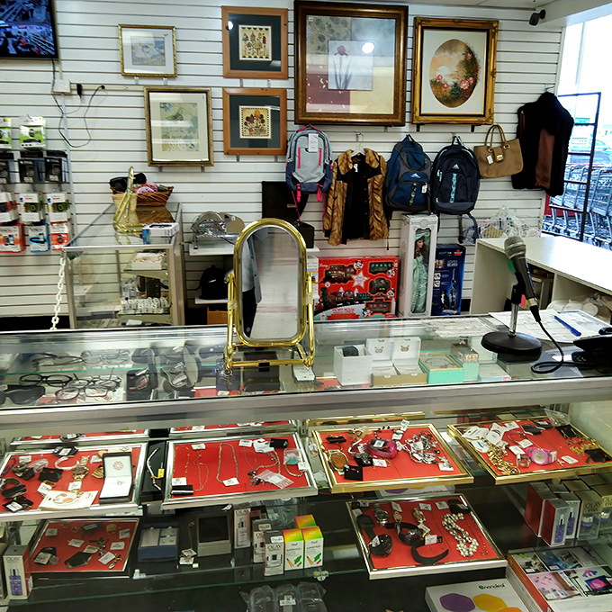 Jewelry displays showcase everything from costume baubles to hidden gems. One person's discarded anniversary gift becomes another's treasure. 