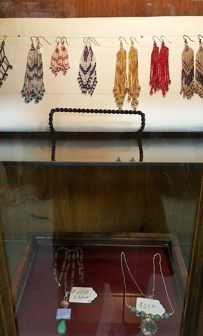 Handcrafted earrings dangle like colorful rain, each pair telling a different story—wearable art that won't break your vacation budget.