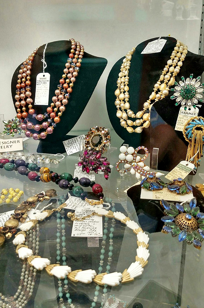Vintage costume jewelry awaits new owners, each piece whispering tales of proms, anniversaries, and special occasions from generations gone by.