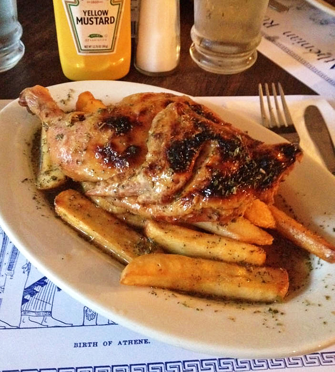 Chicken Kalamata style: where crispy skin meets juicy meat meets herb-flecked potatoes. It's a holy trinity of deliciousness.