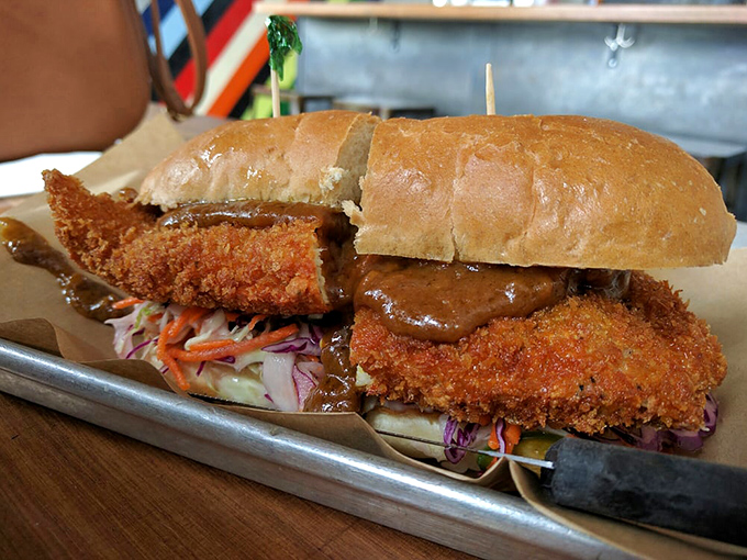 The Katsu Sando &ndash; where crispy panko-crusted goodness meets pillowy bread in a sandwich that would make Tokyo proud.