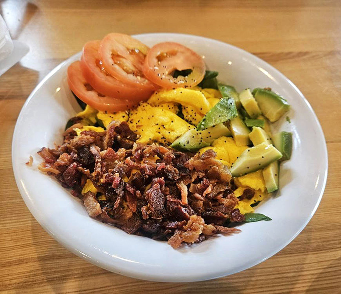 Fresh vegetables and crispy bacon prove healthy eating doesn't require sacrificing flavor or visual appeal entirely.