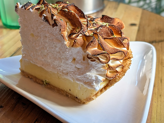 This towering slice of Key lime pie with its toasted meringue crown is the dessert equivalent of a standing ovation.