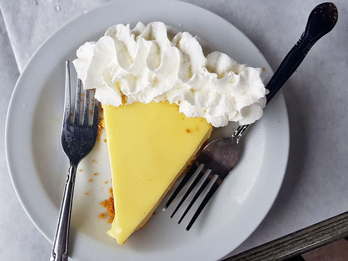 Key lime pie: the perfect sweet-tart finale to a seafood feast. Florida sunshine transformed into dessert form, topped with clouds of whipped cream.
