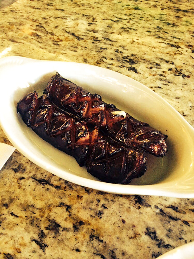 Polish kielbasa that's been grilled to smoky perfection, ready to make your taste buds polka with joy.