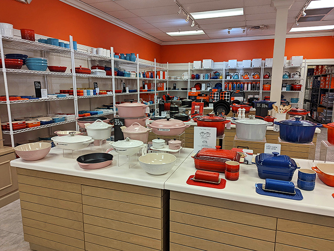 Le Creuset heaven! A rainbow of French cookware that makes you want to quit your job and start that cooking blog you've been threatening your family with.