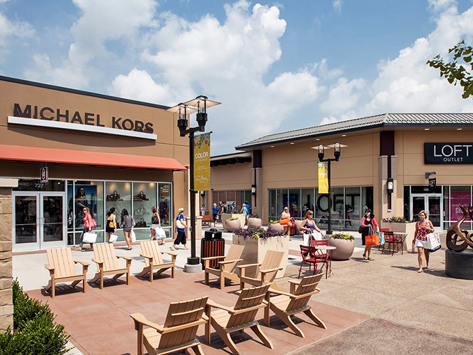Michael Kors and LOFT create a designer's alley with Adirondack chairs strategically placed for "just one more store" negotiations between couples.