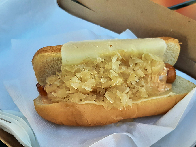 The Kraut Dog: where tangy sauerkraut meets Swiss cheese in a Germanic-American alliance that would make diplomats proud.