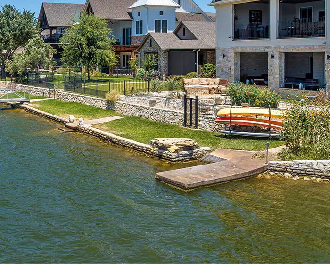 Lakeside living at its finest&mdash;where stone terraces meet crystal waters and kayaks wait patiently for their next adventure.