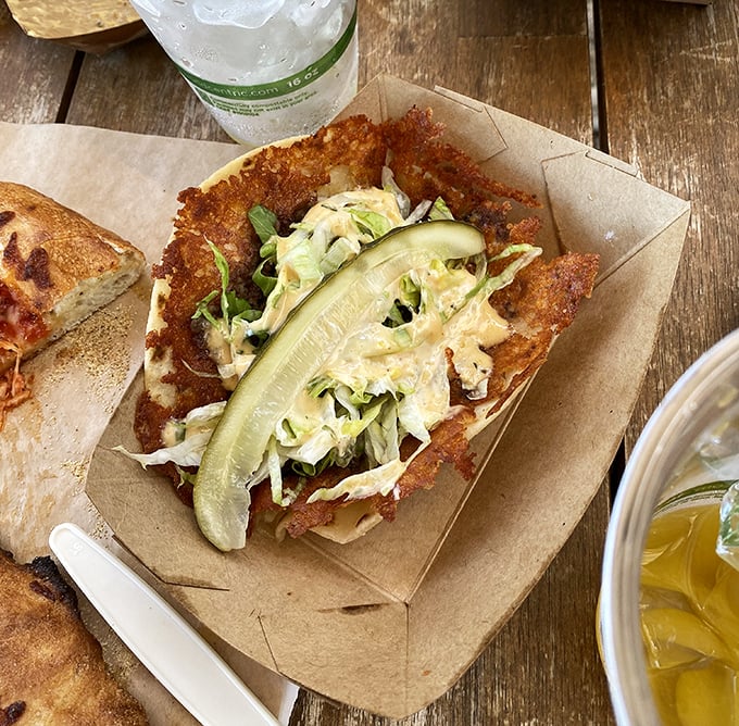 Crispy exterior, tender filling, and a pickle slice that cuts through the richness&mdash;this taco doesn't just satisfy hunger, it creates happiness.