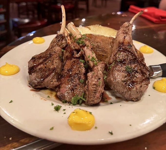 Lamb chops so beautiful they deserve their own portrait session, complete with artistic yellow sauce dots.