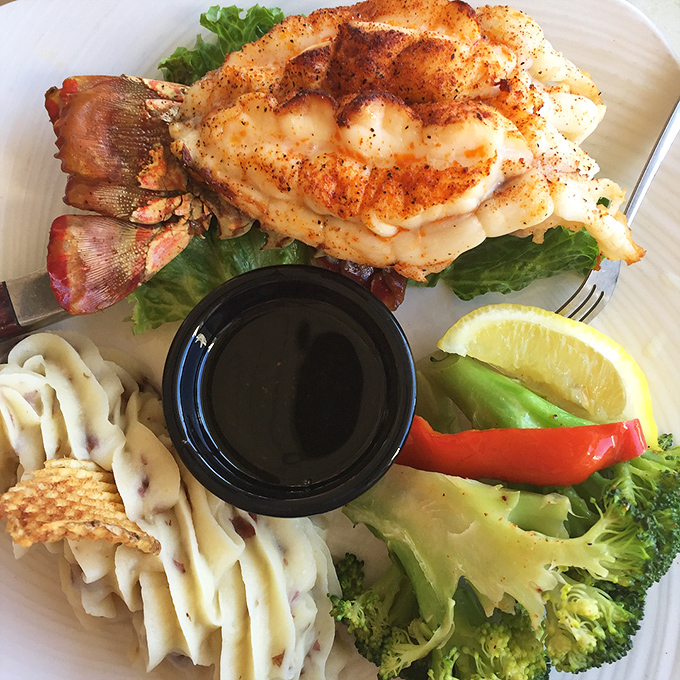 This perfectly grilled lobster tail sits atop a bed of greens with broccoli and mashed potatoes&mdash;proof that sometimes the simplest preparations let great ingredients shine.