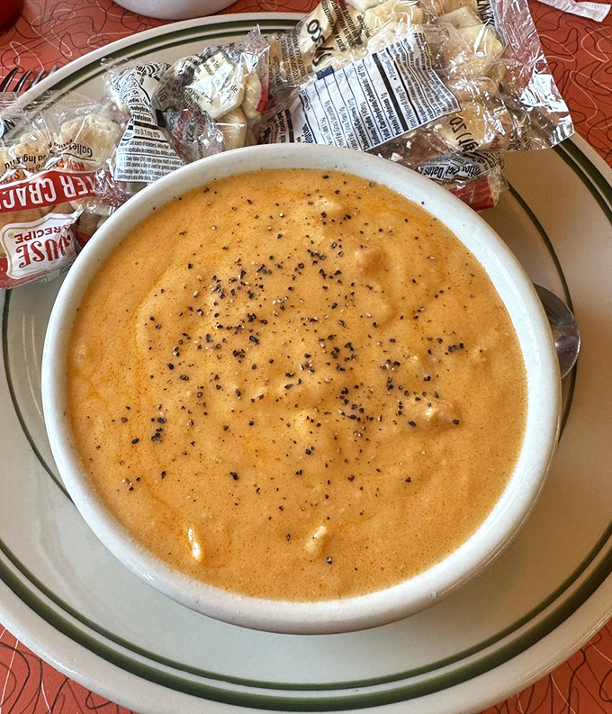 Lobster bisque that's smoother than a Sinatra ballad. The crackers are just backup singers to this creamy orange star.