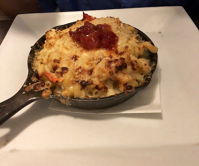 Mac and cheese had a glow-up and decided to vacation by the sea. The result? This gloriously golden lobster mac.
