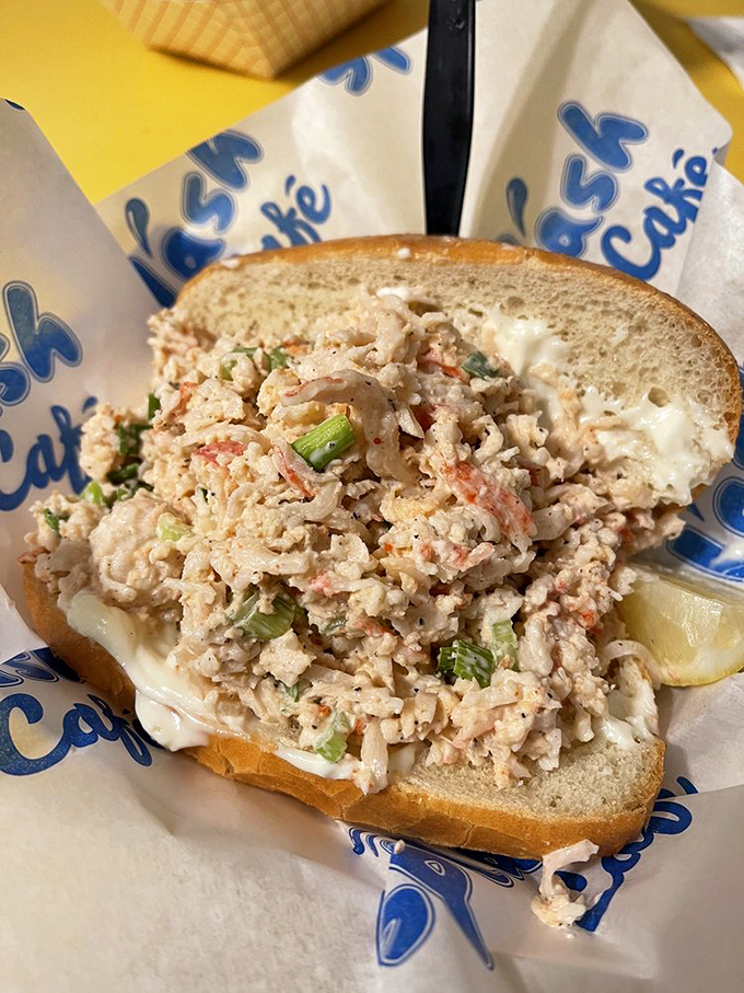That lobster roll is dressed for success &ndash; mayo, fresh greens, and enough lobster to make Maine slightly nervous.