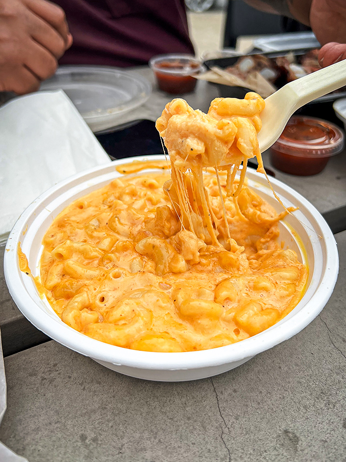 Mac and cheese that stretches like it's auditioning for a dairy commercial&mdash;the perfect creamy counterpoint to all that smoky meat.