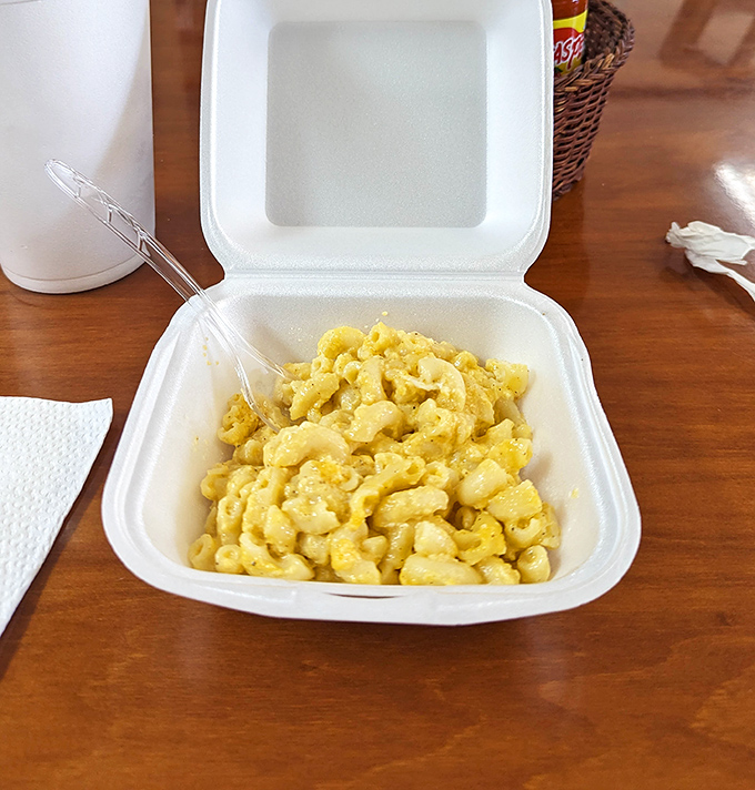 Mac and cheese that achieves the impossible balance &ndash; creamy enough to comfort, structured enough to respect itself.