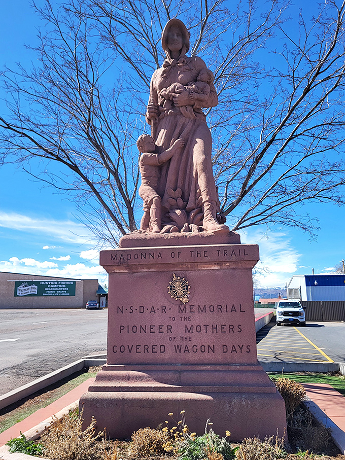 The "Madonna of the Trail" monument stands as a powerful tribute to pioneer mothers who braved the westward journey, their courage cast permanently in stone.