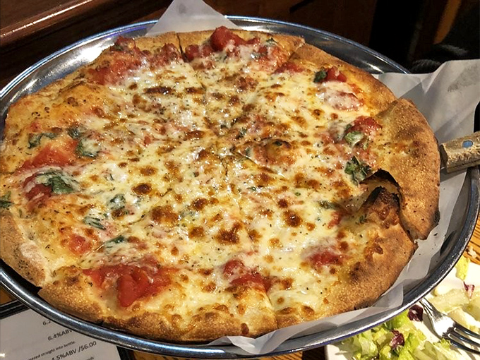 The Margherita pizza proves simplicity is the ultimate sophistication &ndash; fresh basil, melted mozzarella, and tomato sauce in perfect harmony.