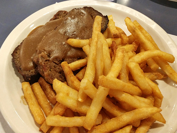 Meatloaf that would make your grandmother both proud and jealous, swimming in gravy that deserves its own appreciation society.