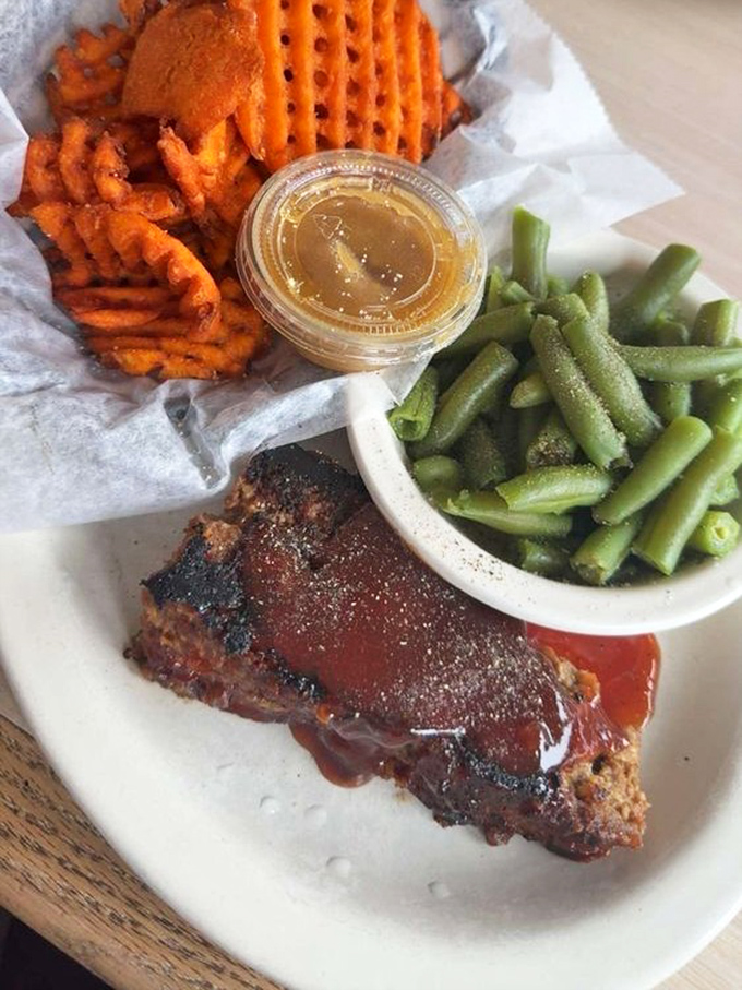This meatloaf doesn't need a fancy introduction&mdash;it's wearing a BBQ sauce tuxedo and brought green beans and sweet potato fries as its plus-ones.