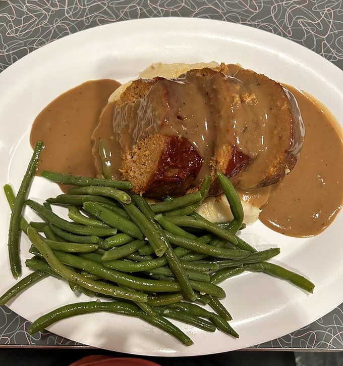 Meatloaf that doesn't just sit there looking pretty&mdash;it demands respect. Smothered in gravy that would make your cardiologist wince and your taste buds applaud.