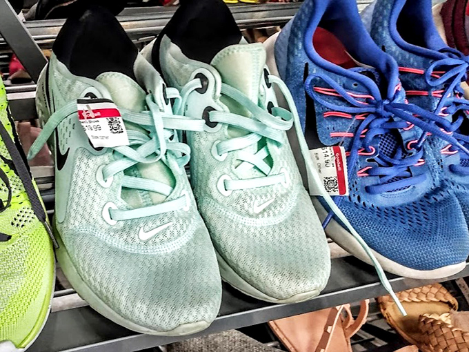 Barely-worn Nikes nestled between vintage loafers and hiking boots. Someone's abandoned fitness resolution becomes your new favorite workout shoe.