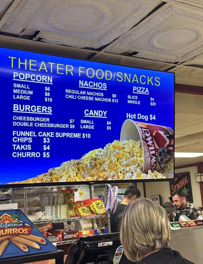 Movie munchies menu board showcasing the classics&mdash;where popcorn comes in buckets, not those wimpy bags they give you at multiplexes.