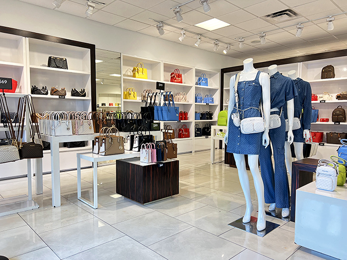 Michael Kors displays handbags like fine art, because at these prices, they basically are.