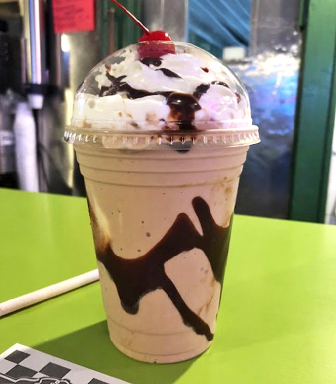 This isn't just a milkshake&mdash;it's a work of art. The chocolate swirls are like Jackson Pollock decided to get into the dessert business.
