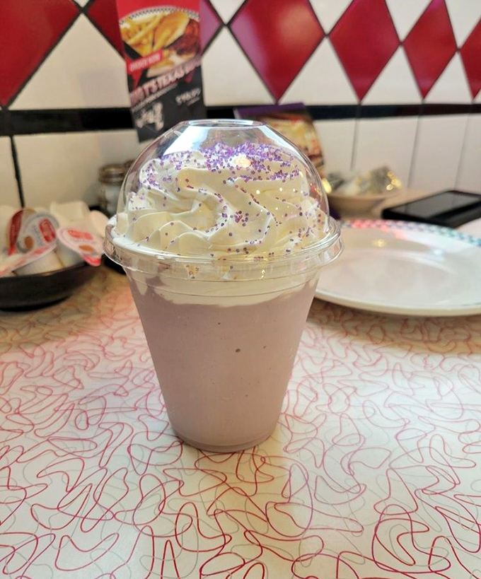 Milkshakes that require both a straw AND a spoon. The purple sprinkles aren't just decoration&mdash;they're a promise of childhood joy in adult form.