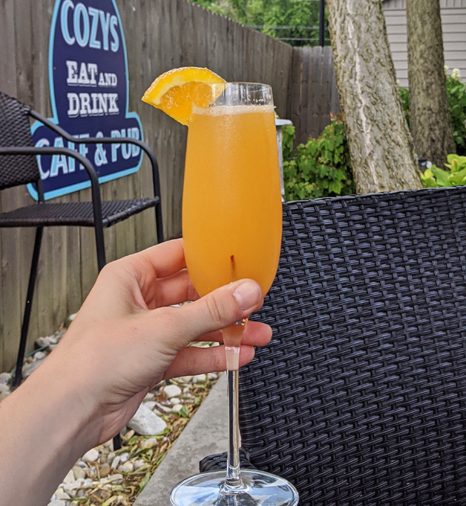 Sunshine in a glass! This mimosa brings weekend vibes to any day, especially when enjoyed on Cozy's outdoor patio.
